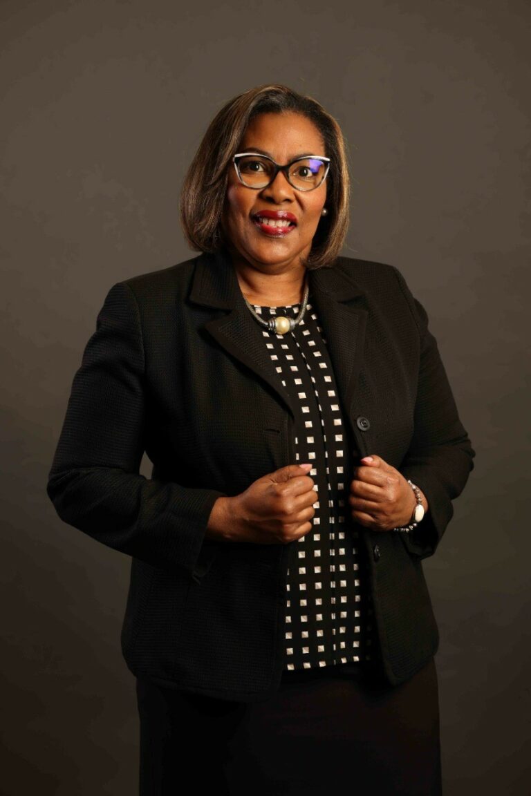 Mrs. Hillary Robertson, Commissioner - Financial Services Commission