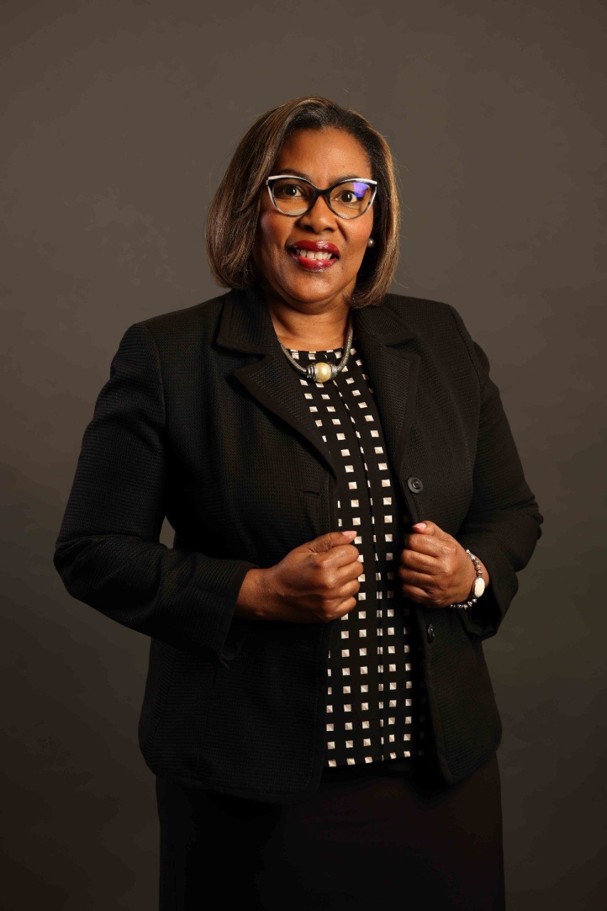 Mrs. Hillary Robertson, Commissioner - Financial Services Commission