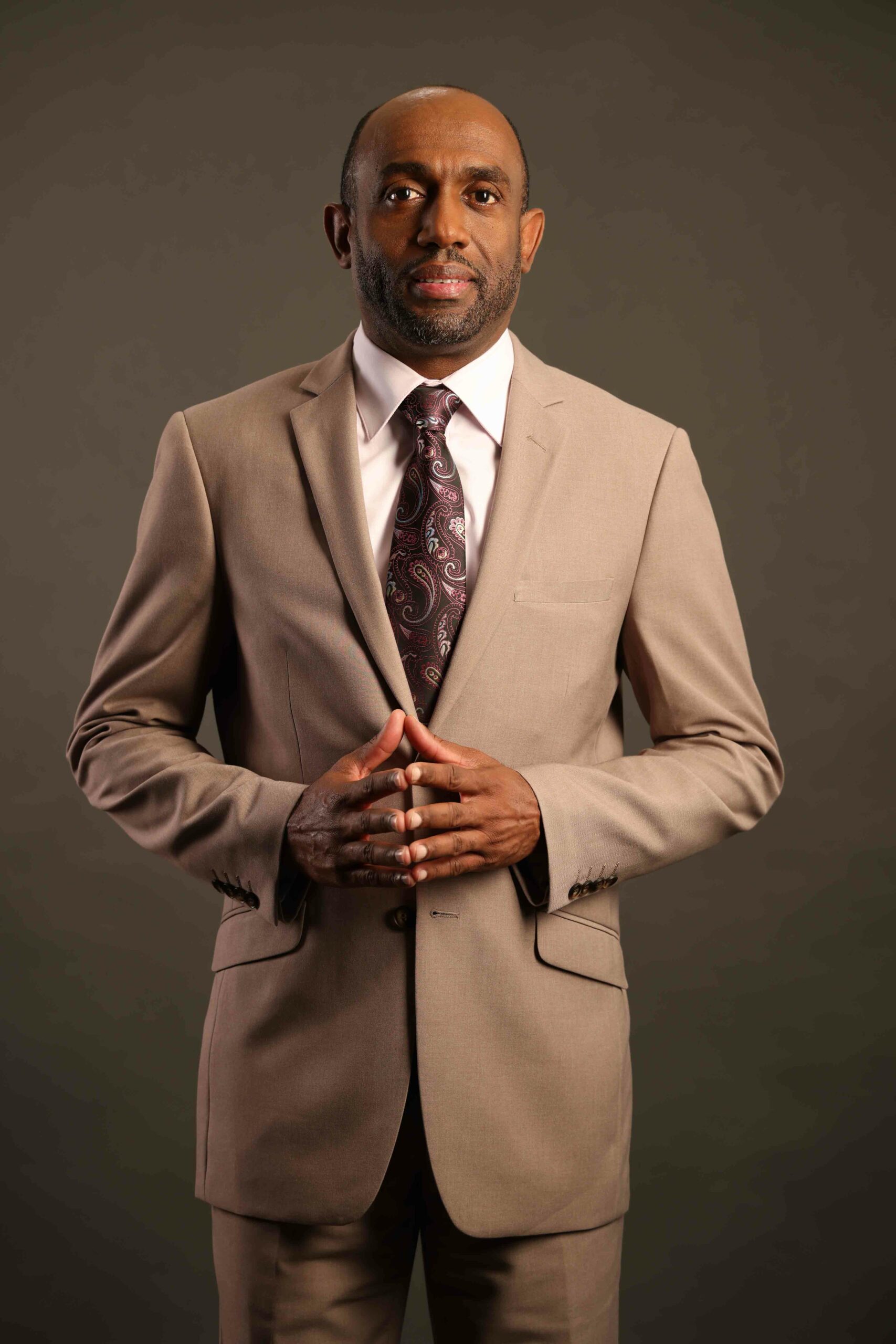 Dr. Wayne Robinson, Commissioner - Financial Services Commission